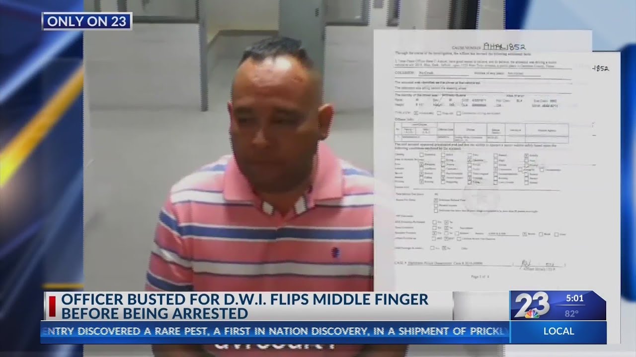 Cop gives middle finger to fellow arresting officer - YouTube