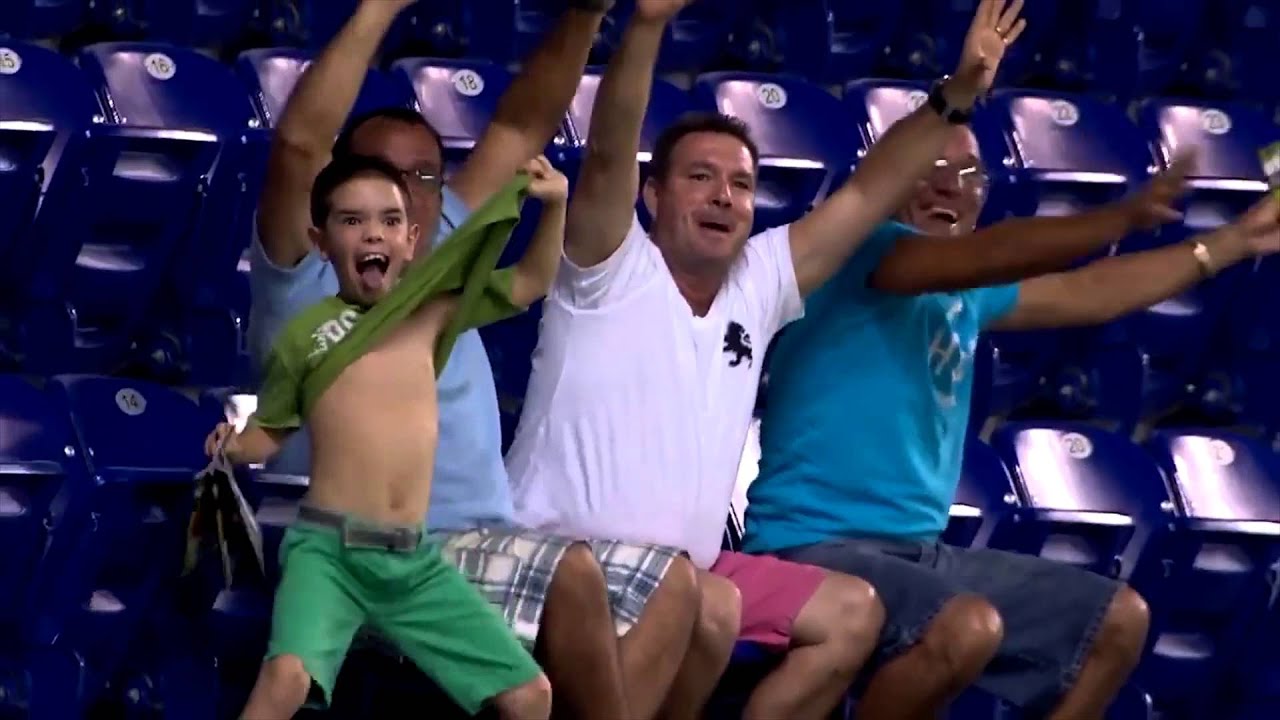 Crazy dancing kid in the stands reacts to "Karma Farmer" - YouTube
