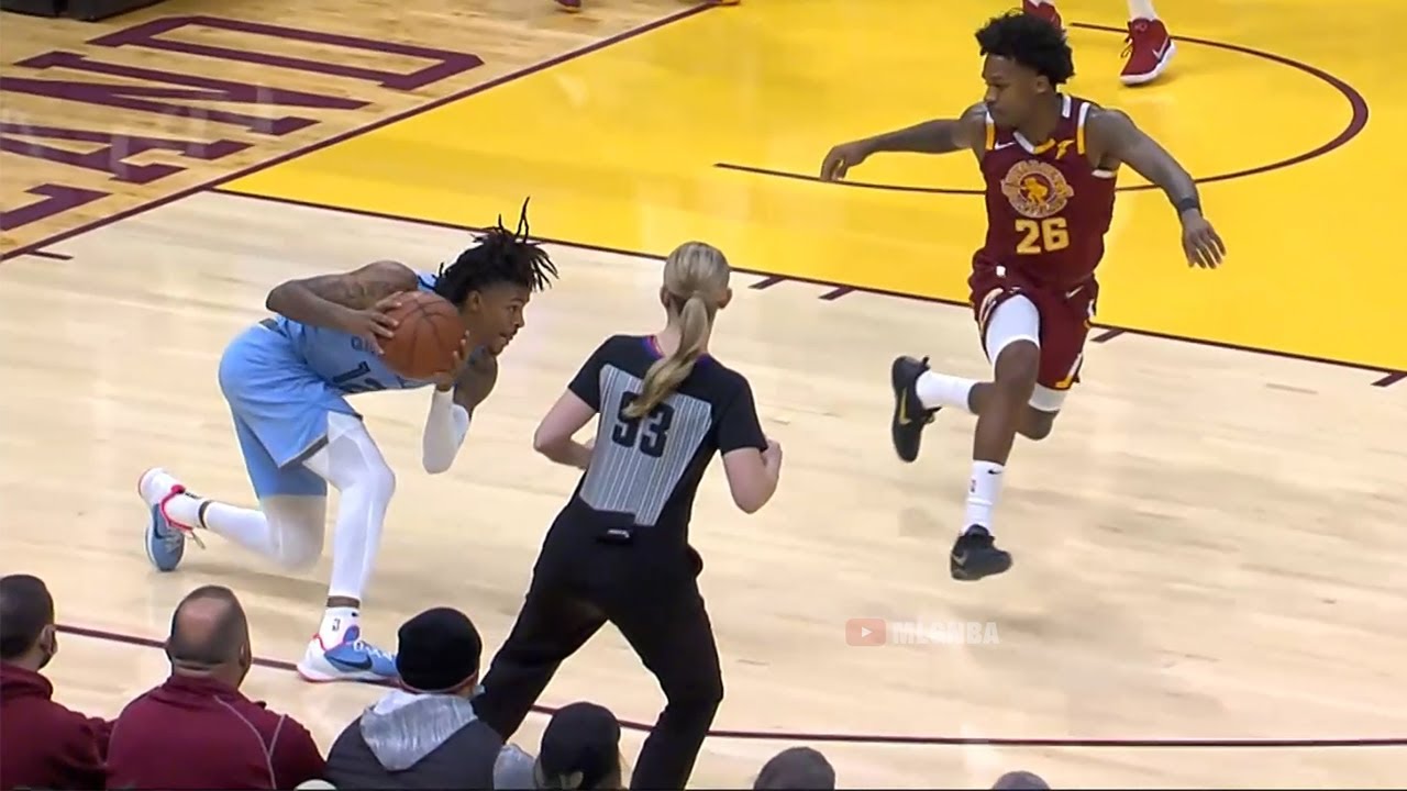 Ja Morant gets away with an obvious walk while the ref is literally ...