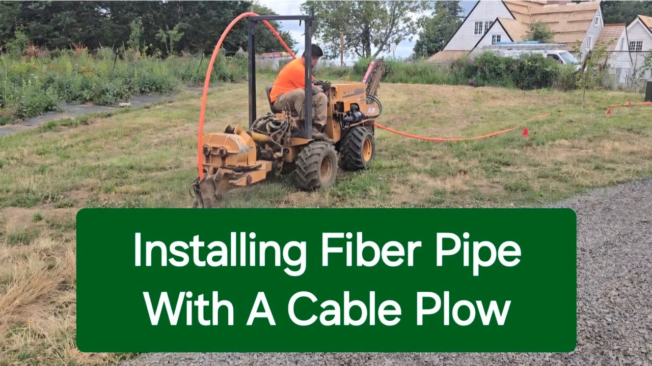 Plowing in Pipe for fiber with Maxi Sneaker Plow - YouTube