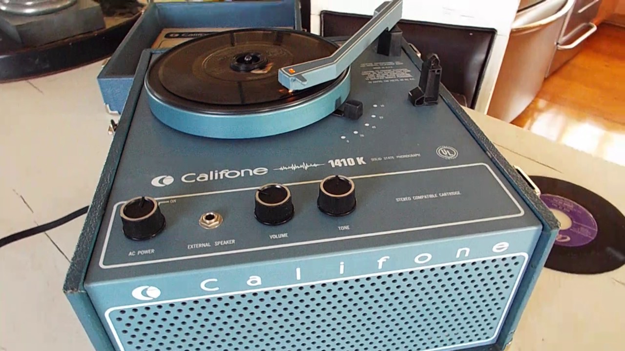 Califone manual 4 speed record player playing a 45 RPM, 7" record - YouTube