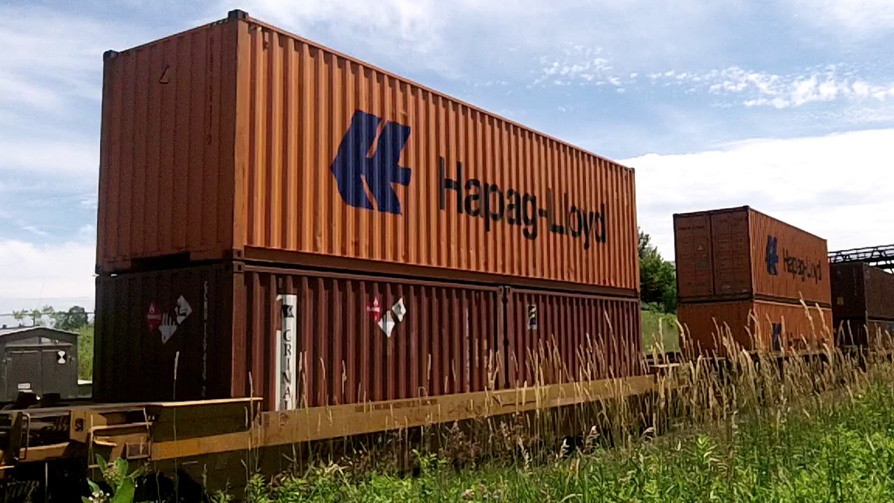 CN 148 w/ CN Engines 8963 & 5702 lead this long 516 axle, EB Intermodal ...