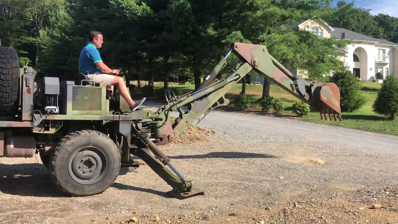 Unimog SEE 419 FLU Backhoe Deployment - YouTube