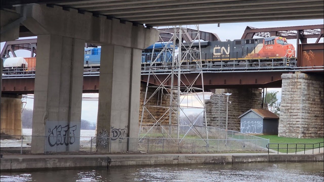 CN train going across a bridge Sainte-Anne-de-Bellevue heading towards ...