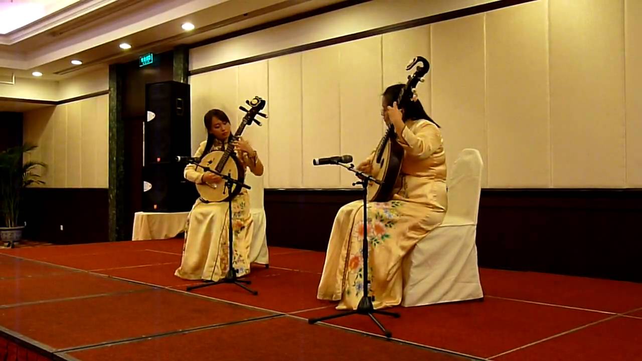 Chinese guitar duo - YouTube