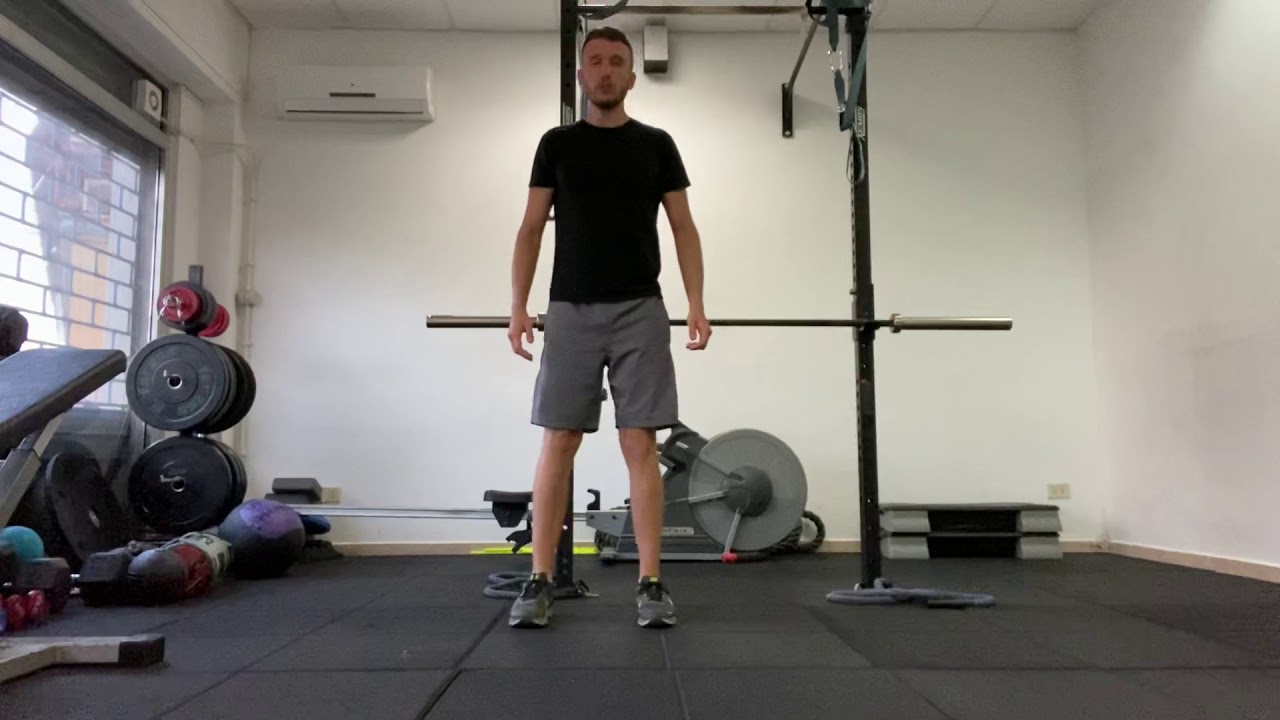 Come eseguire un Toe Touch Squat - YouTube