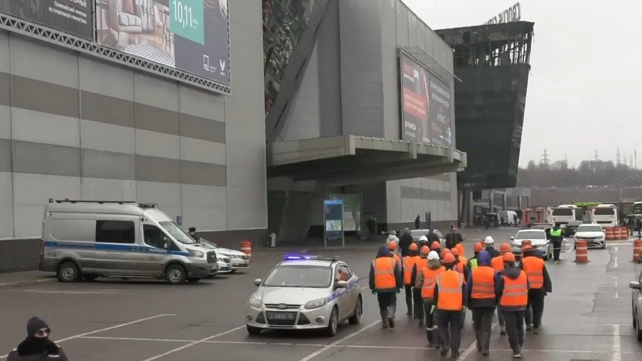 Emergency workers arrive at destroyed Moscow concert hall - YouTube