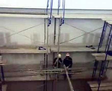 setting scaffold above escalators - YouTube
