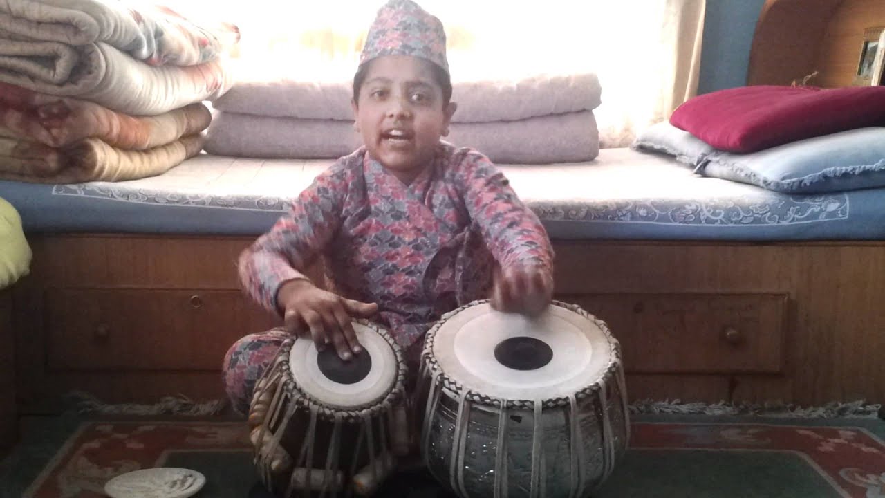 Child playing tabala - YouTube