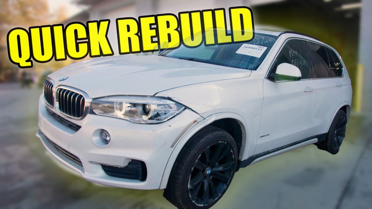 Rebuilding a Salvage BMW X5 Part 1 - YouTube