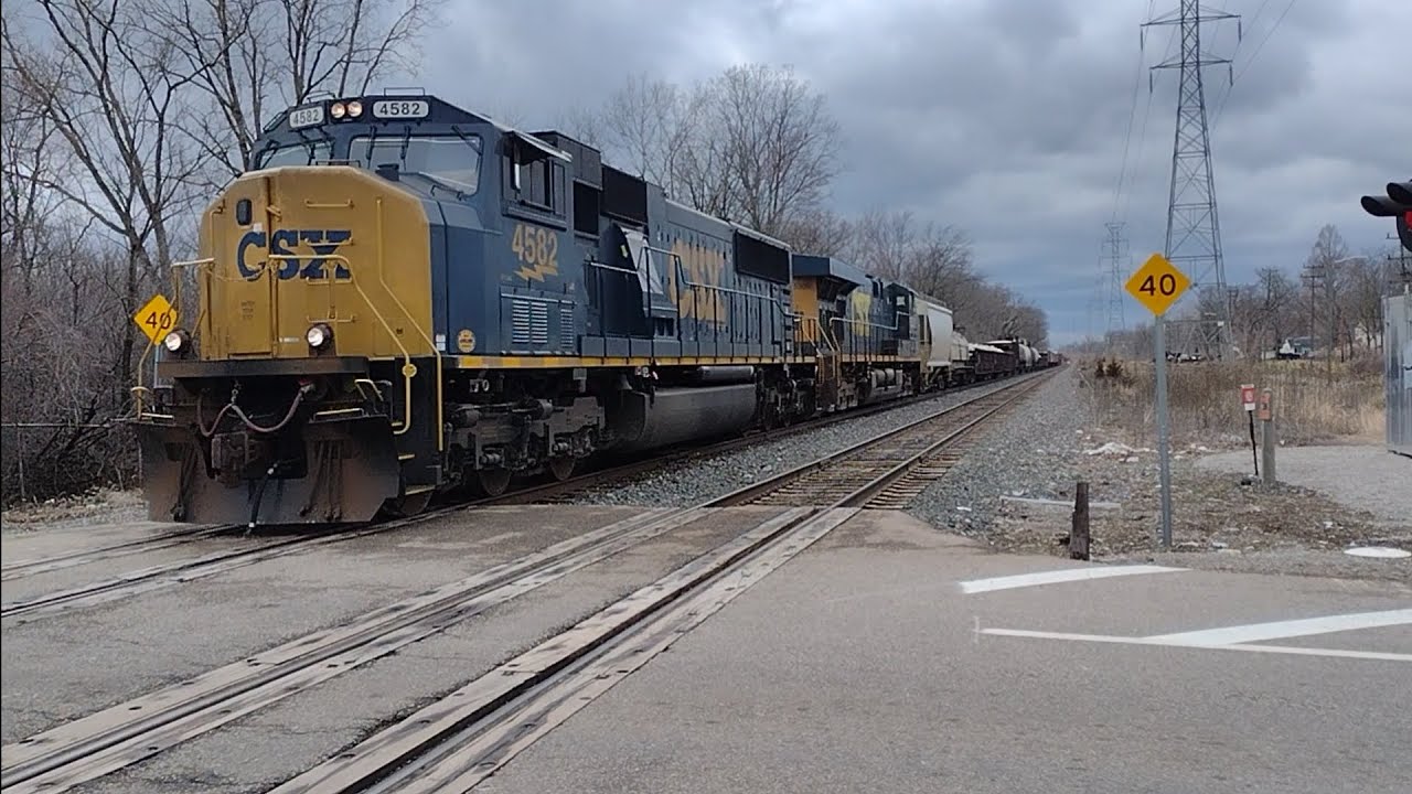 CSX 4582 SD70MAC rebuilt & CSX 5308 ES40DC leads the CSX M510-01 with a ...