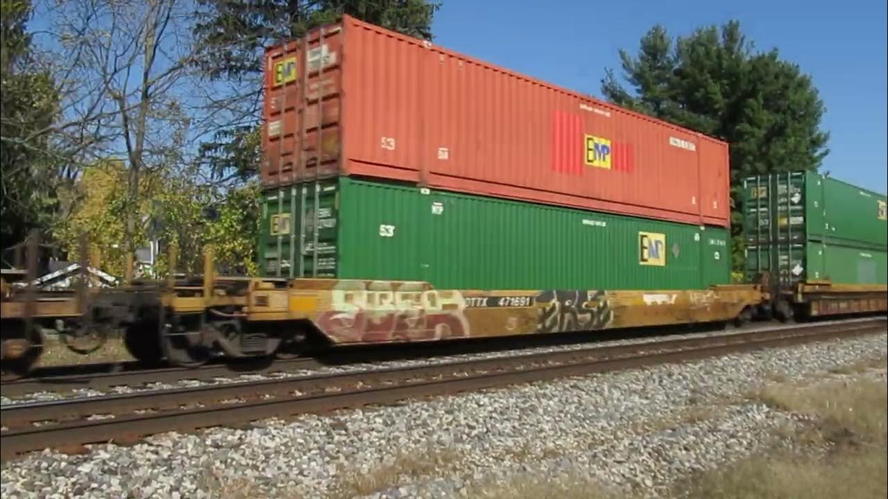 CN 5728, 5641 running a Westbound intermodal container in well car train through Vicksburg, MI ...