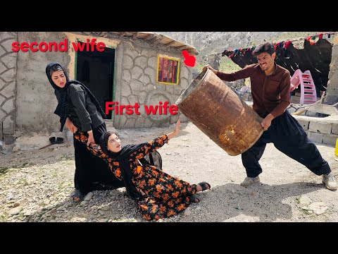 Ramin's anger: Harassing his first wife to leave Zulfa's hut, his second wife