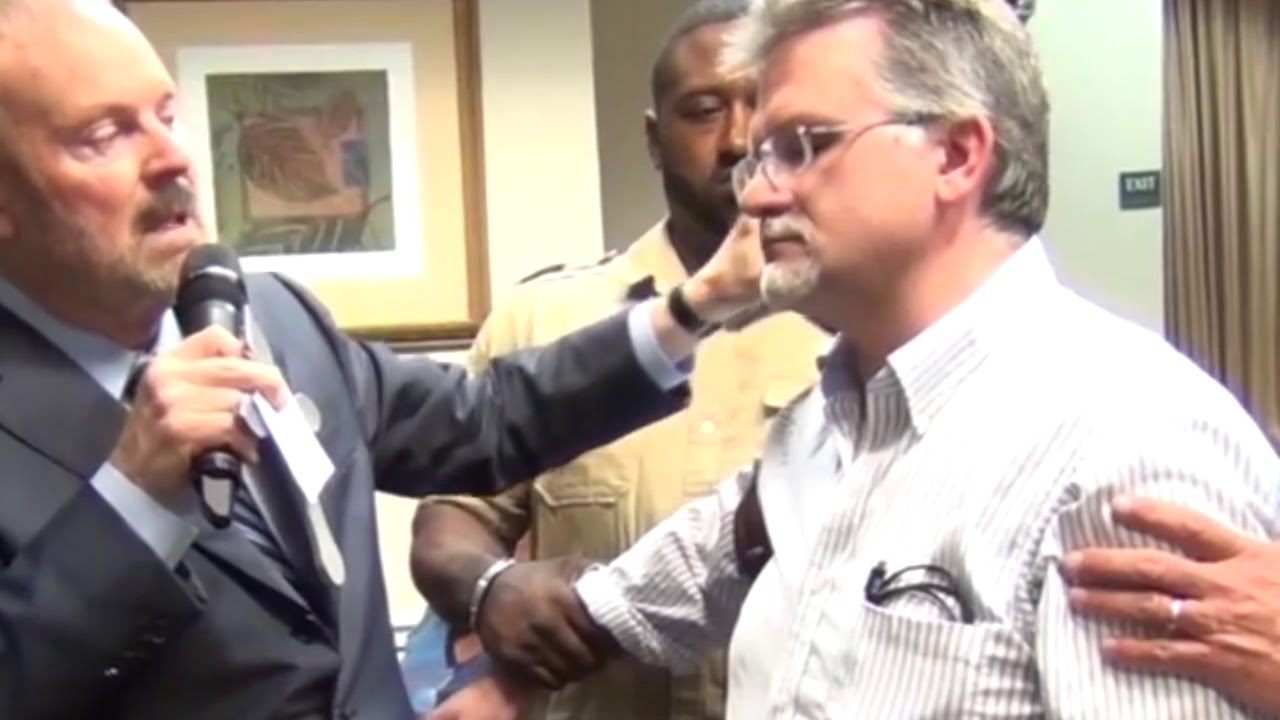 Exorcist Bob Larson hits Guy with Bible - YouTube