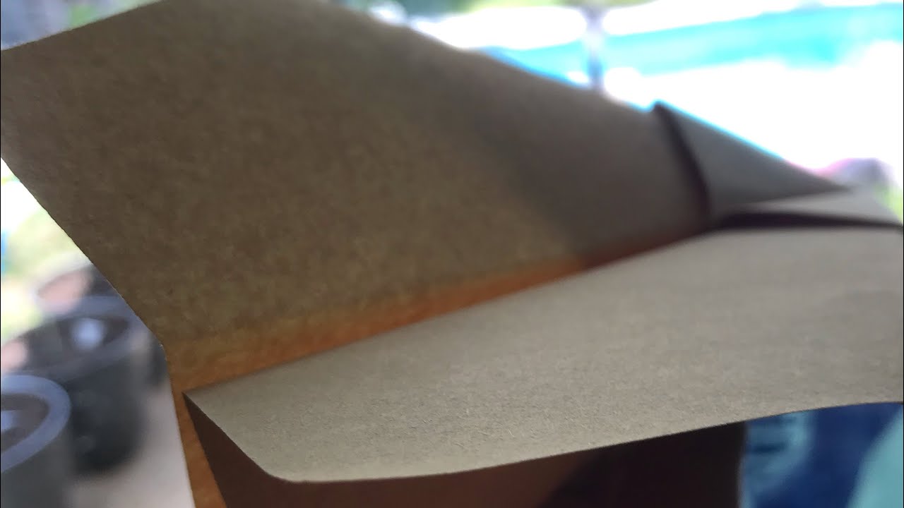 How to make an origami airplane that flies far! - YouTube