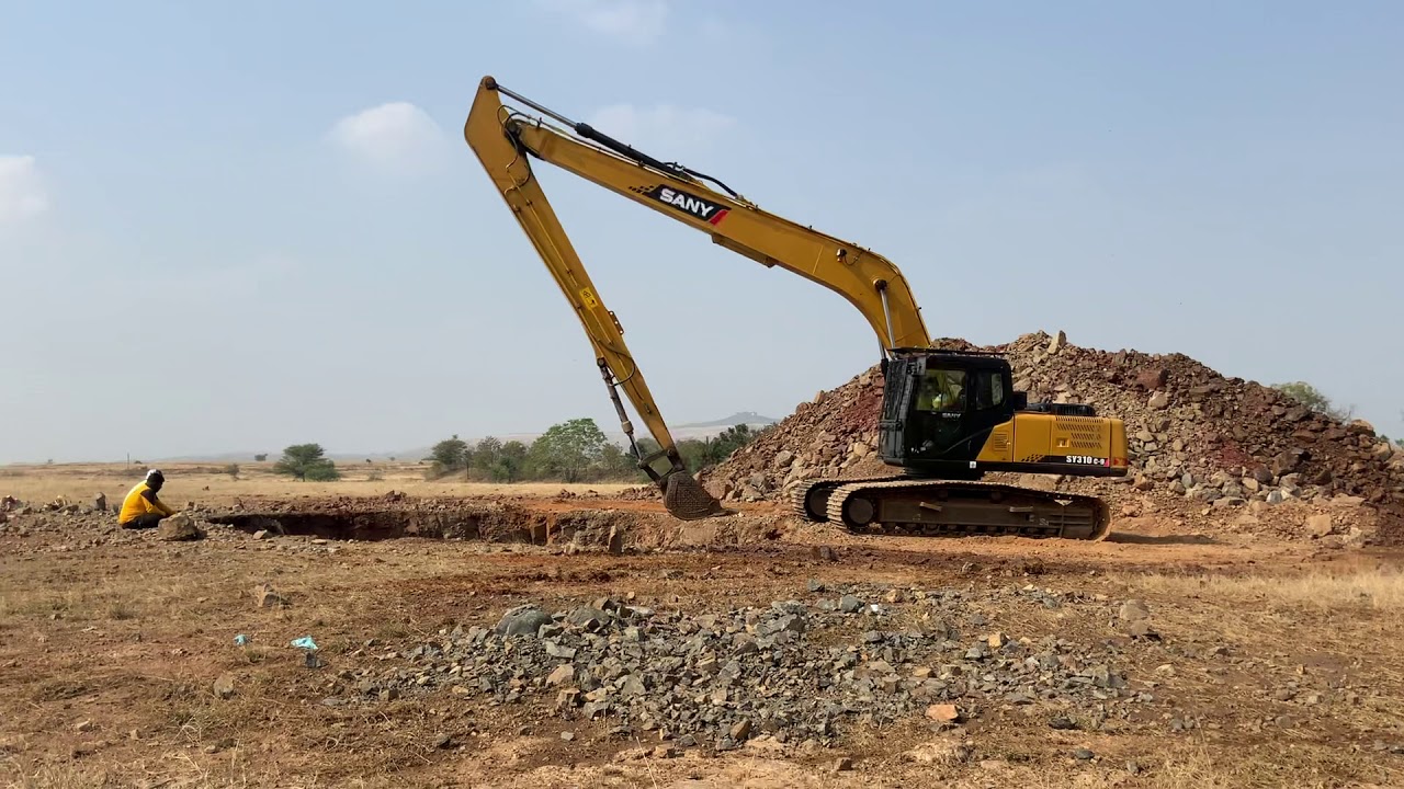 SANI long reach Excavator Making 50 feet Well - YouTube