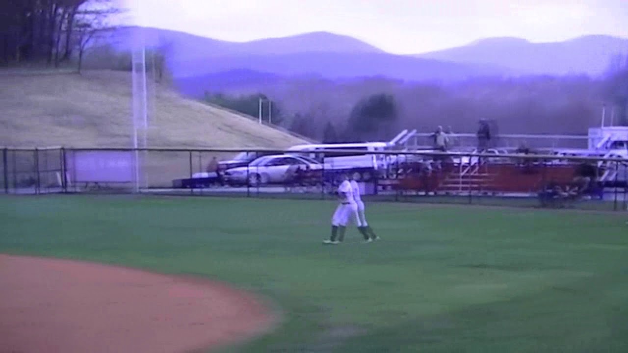 00214--Running over-the-sholder catch near the fence. - YouTube