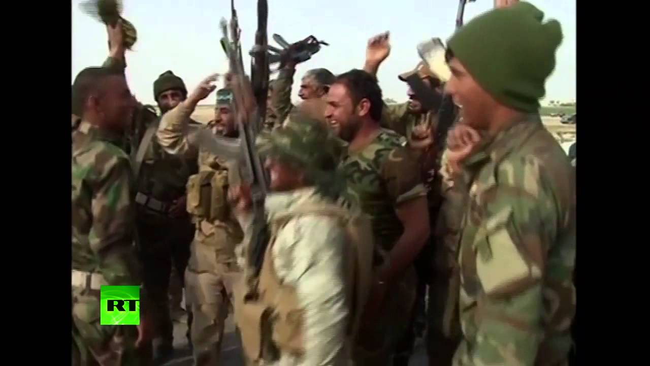 Iraq forces celebrate victory over ISIS near Tikrit - YouTube