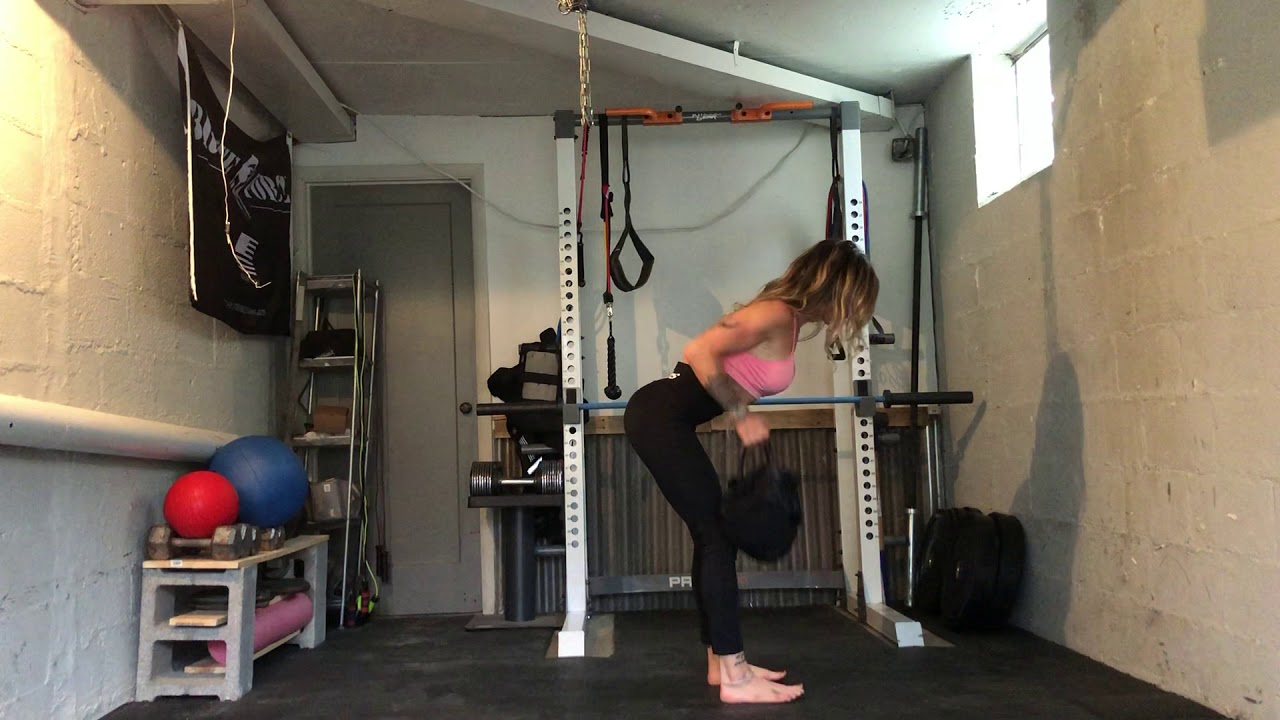 EXERCISE LIBRARY/sandbag bent over row - YouTube