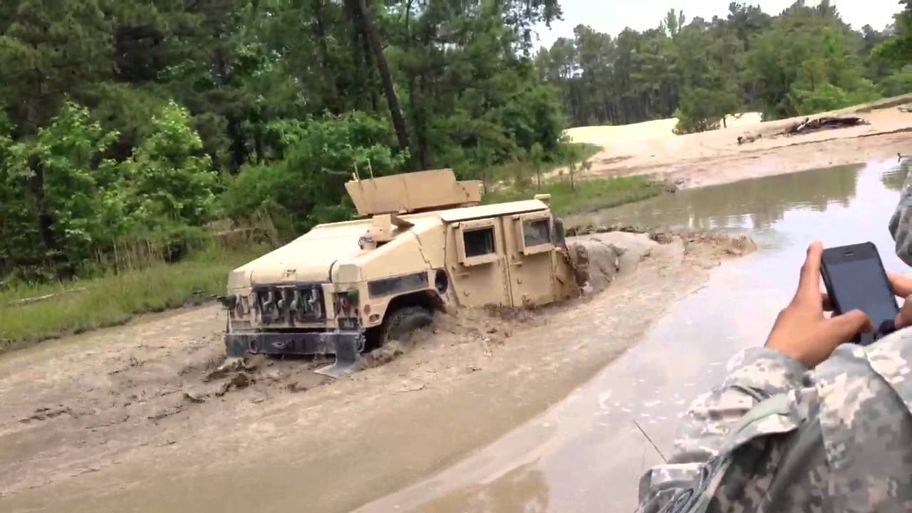 Humvee through mud hole - YouTube