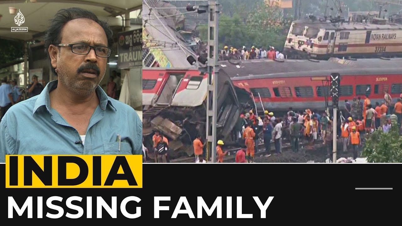 Man searches for missing nephew at Indian train crash site - YouTube