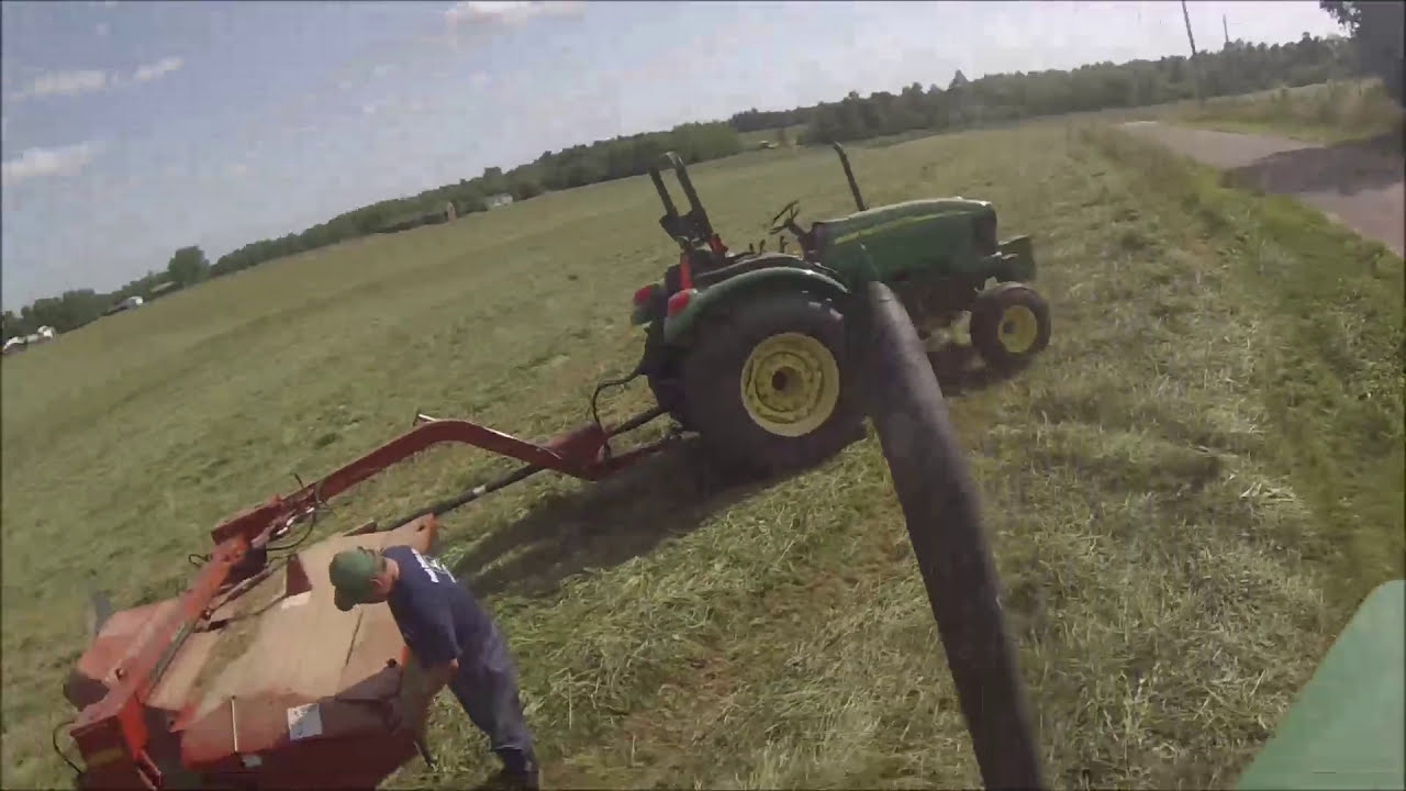 Mowing hay. Finally!! - YouTube