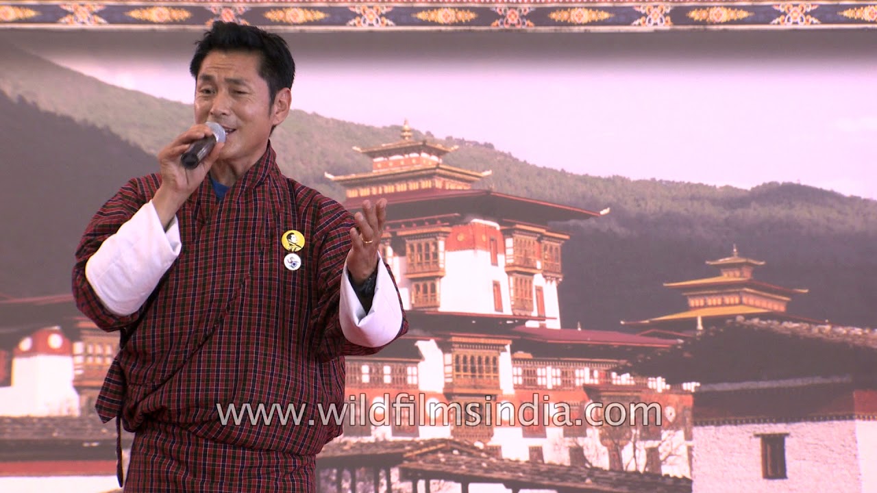 Bhutanese pop singer Tshering Paljor singing a love song - YouTube