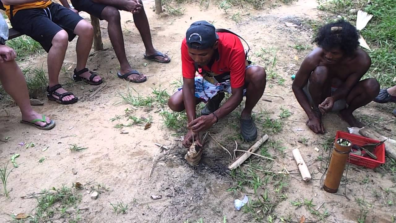 Starting fire using traditional means - YouTube