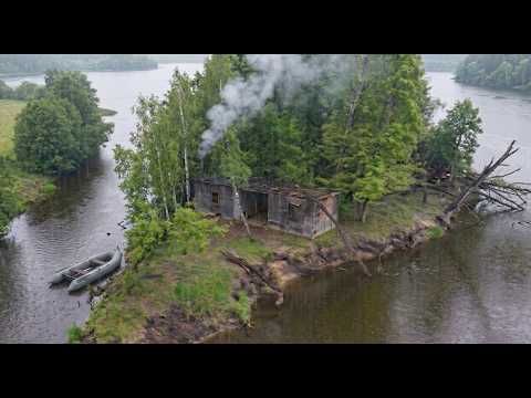 thunderstorm and rain in an abandoned anglers shelter , catch and cook