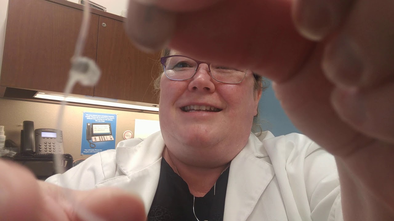 How to change domes and retention wires on Signia hearing aids - YouTube