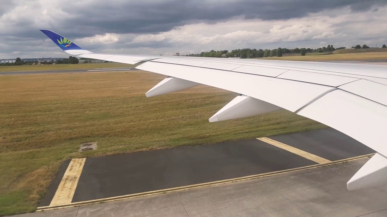 Air caraibes A350 wing view take-off [4k] - YouTube