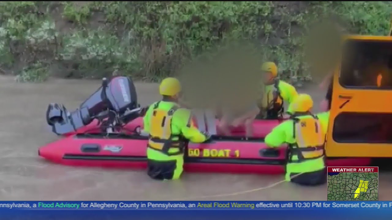 School Bus Trapped In Rising Flood Waters - YouTube