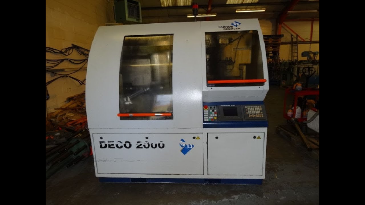TORNOS DECO 2000/13 CNC SLIDING HEAD LATHE - YouTube