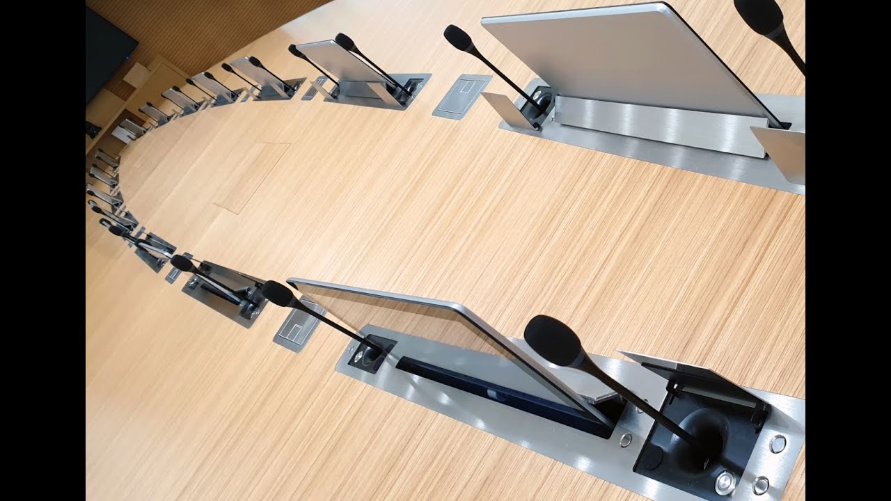 Retractable Monitor and Microphones perfectly integrated in a ...