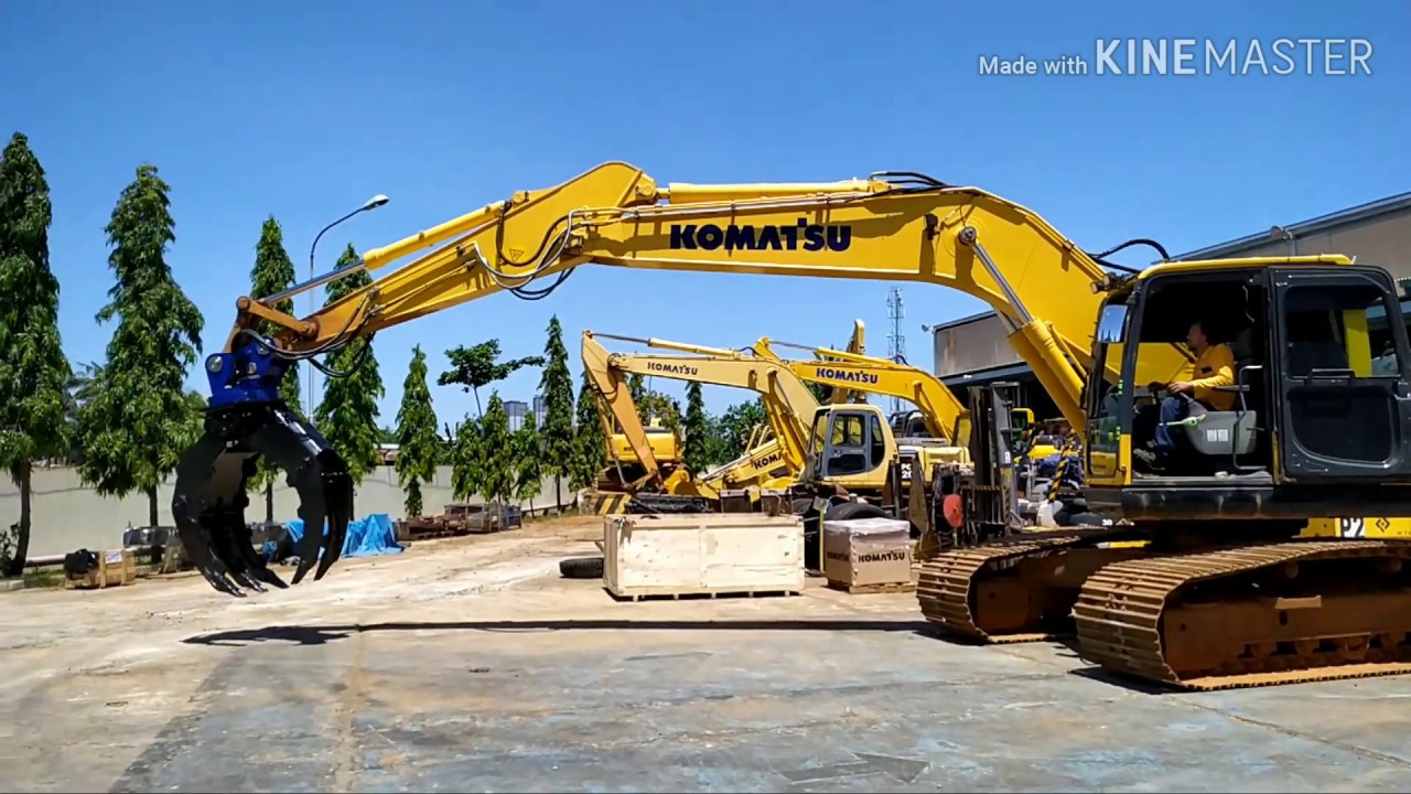 Install stone grapple to PC200-8mo - YouTube