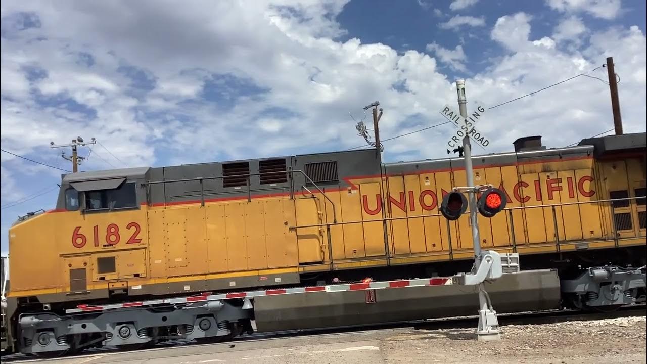 UP 1377 passes 20th St and backs up - YouTube