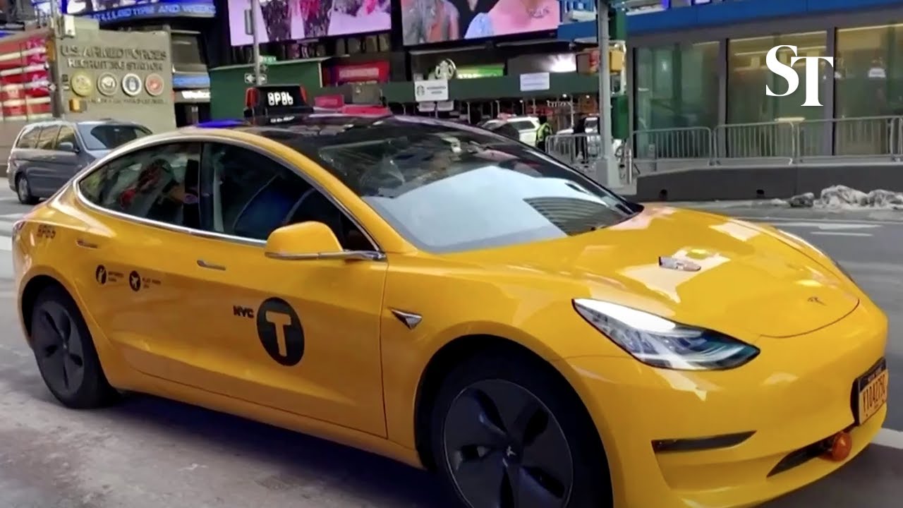 Tesla delays robotaxi launch to October, shares hit - YouTube
