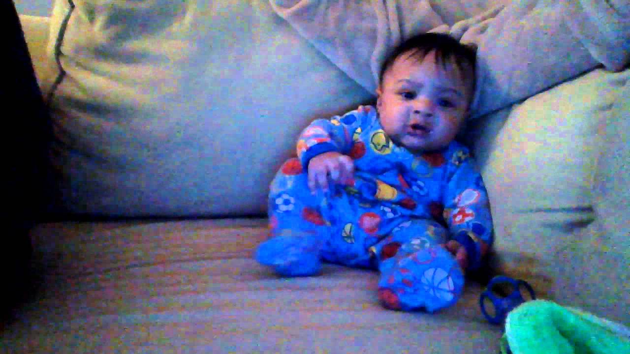 Jayen 4 months playing with rattle - YouTube
