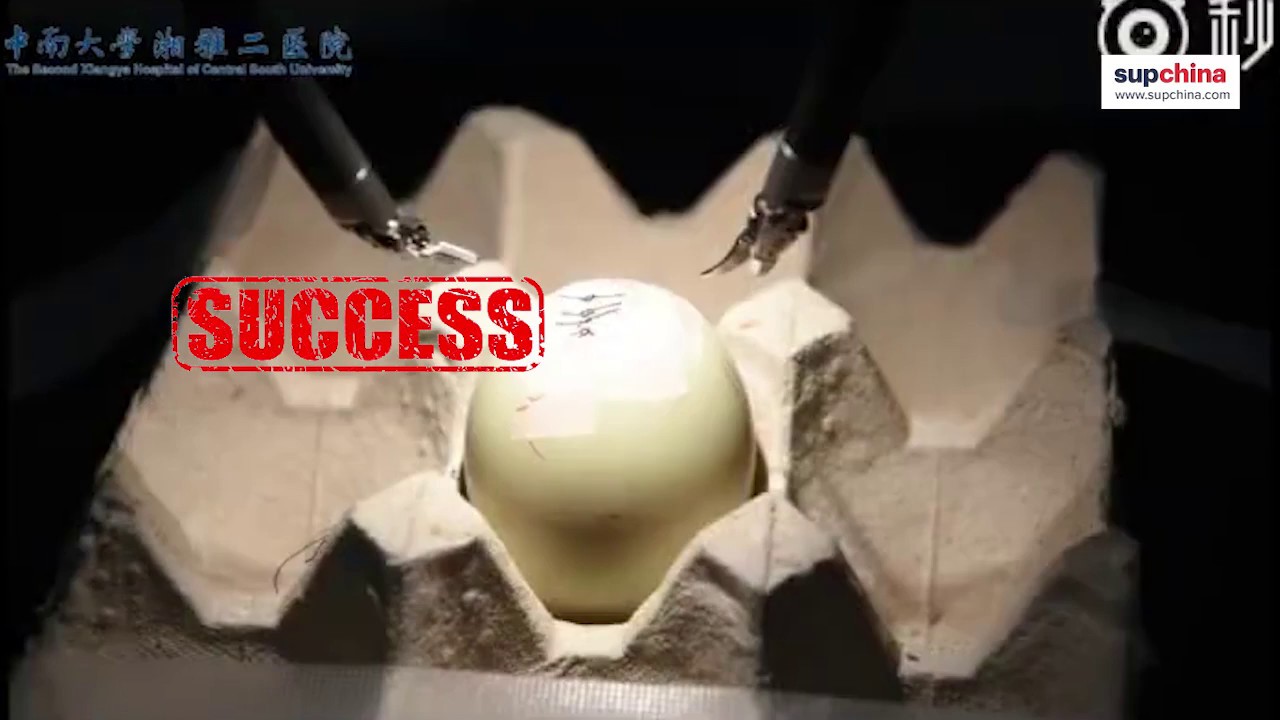 This robot surgeon stitches an eggshell membrane - YouTube