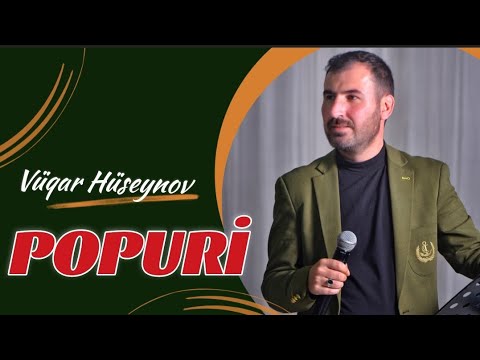 Vuqar Hüseynov Dodağına gülüş qonub Popuri