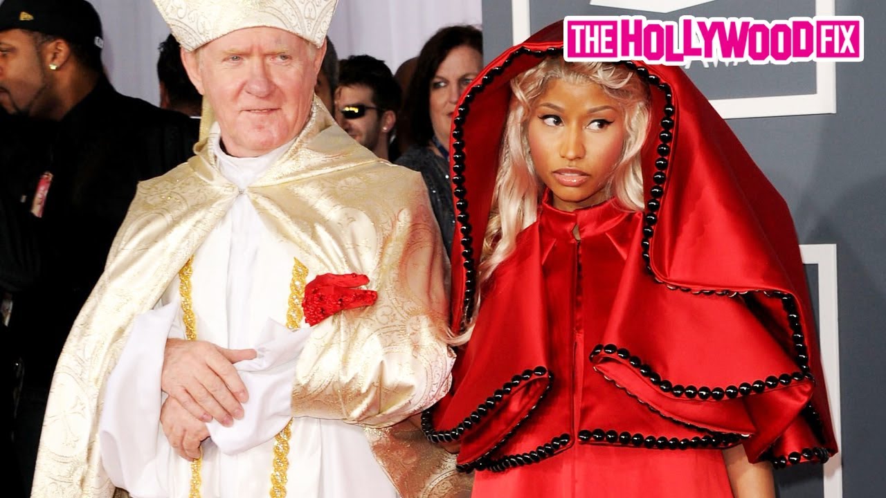 Nicki Minaj Stuns In A Red Hooded Versace Gown With The Pope For A ...
