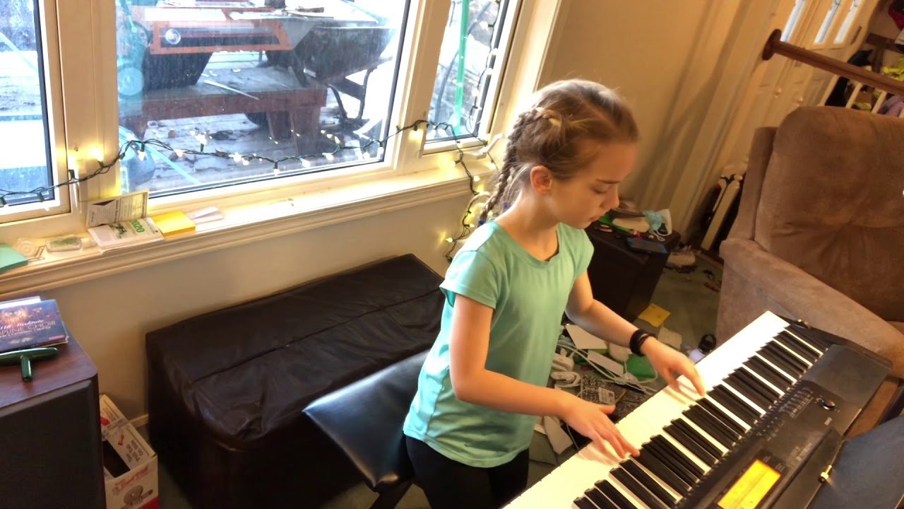 Meg playing piano - YouTube