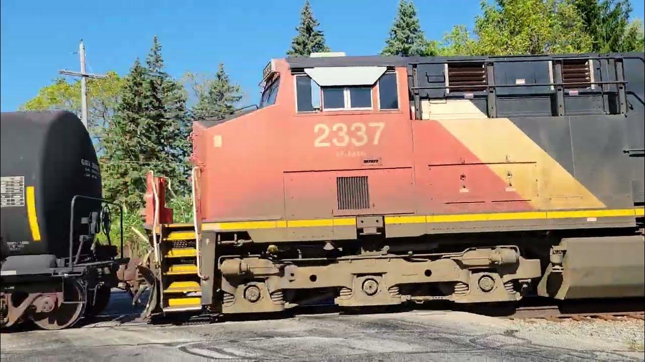 CN 8835, 2337 Eastbound train with tank cars, automobile carriers - YouTube