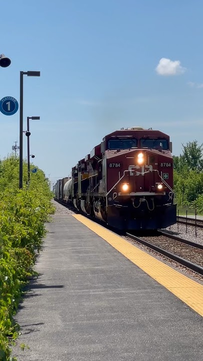 CP 8784 leads a CPKC 247 through Mayfair - YouTube