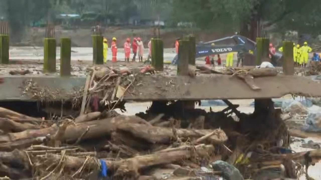Rescuers search through mud and debris as deaths rise to 151 in ...