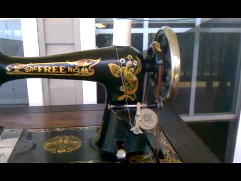 Winding a bobbin on The Free No. 5 treadle sewing Machine - YouTube