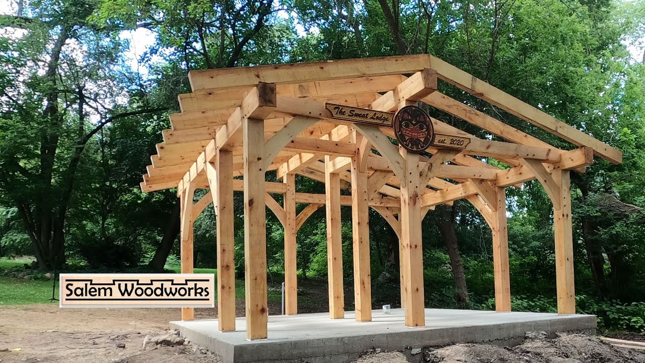 Raising the frame for a timberframe sauna - YouTube