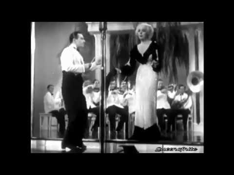 George Raft Dances to Alice Faye singing "I Feel a Song Coming On ...