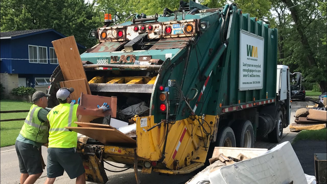Old Waste Management Garbage Trucks Packing Bulk at Clean Ups - YouTube