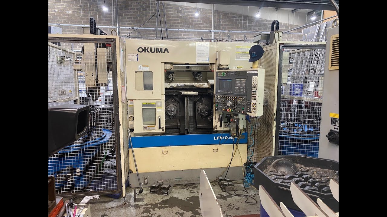 Okuma LFS10-2SP 4 Axis Twin Spindle CNC Lathe with loader-unloader and ...